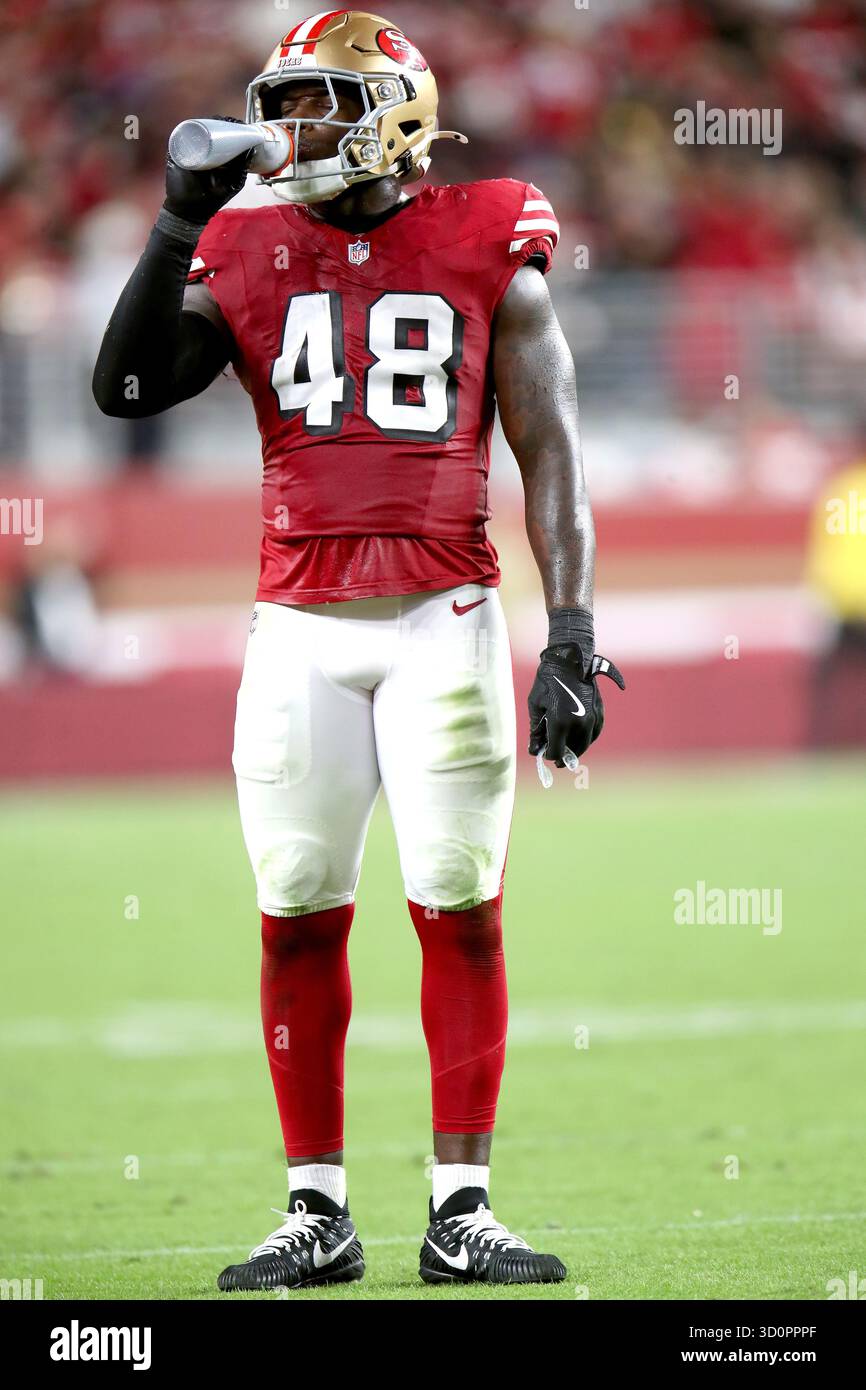 San Francisco 49ers linebacker Tatum Bethune (48) drinks from a ...