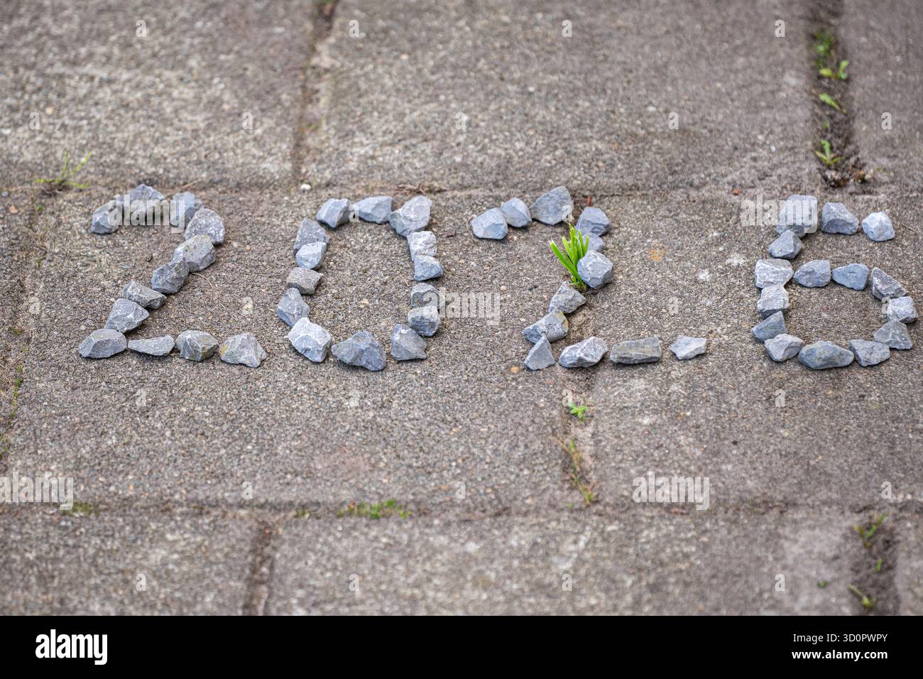 Gravel numbers 2026 on gray stone footpath – creative New Year concept ...
