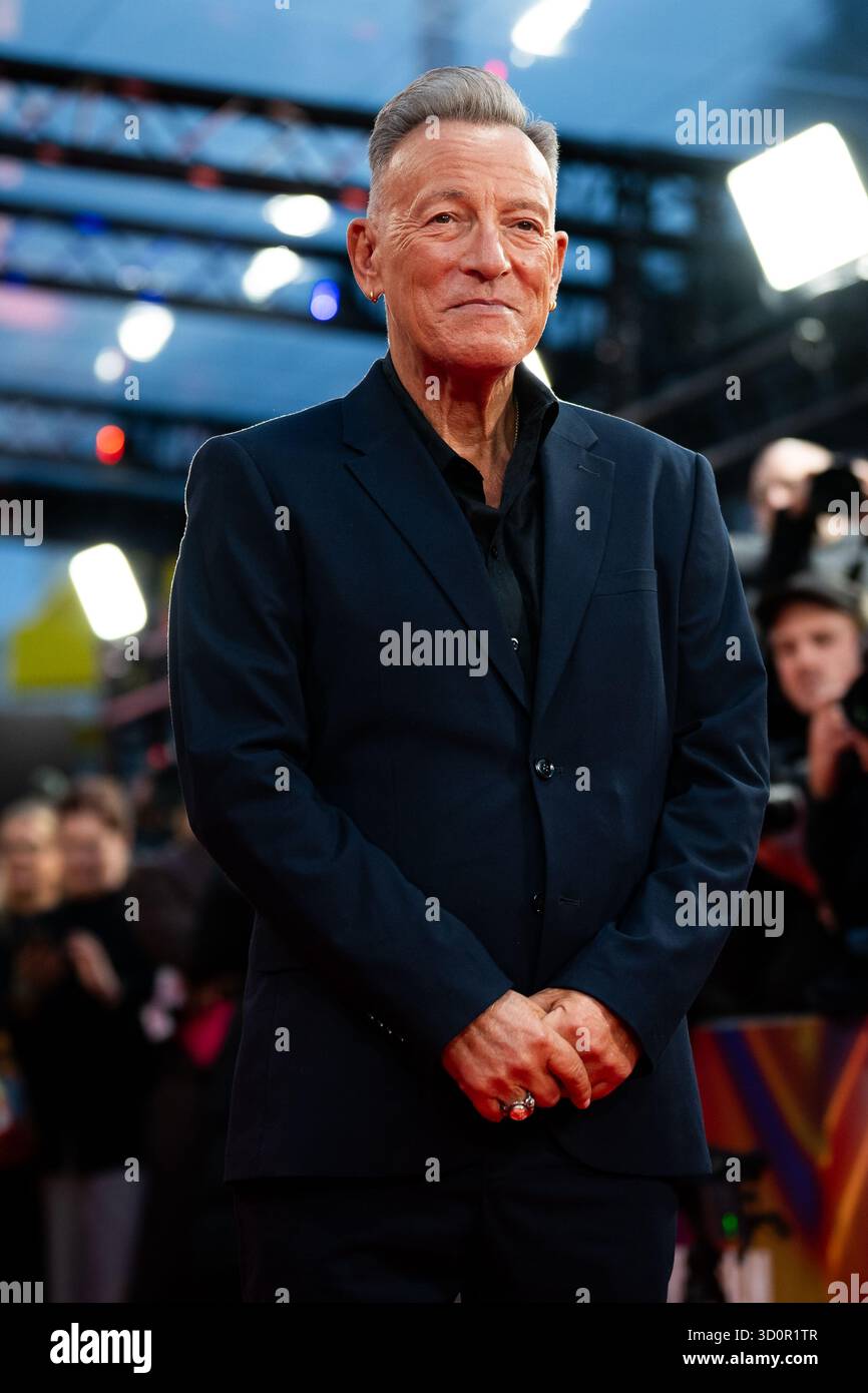 Bruce Springsteen poses for photographers upon arrival at the premiere ...