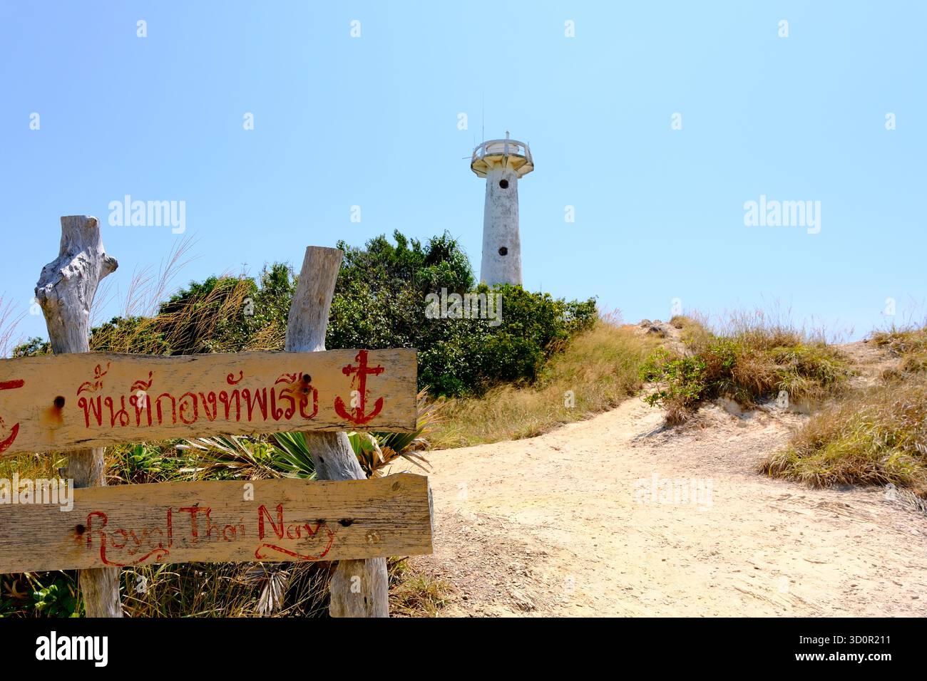 Path leading to the white lighthouse in Mu Ko Lanta National Park ...