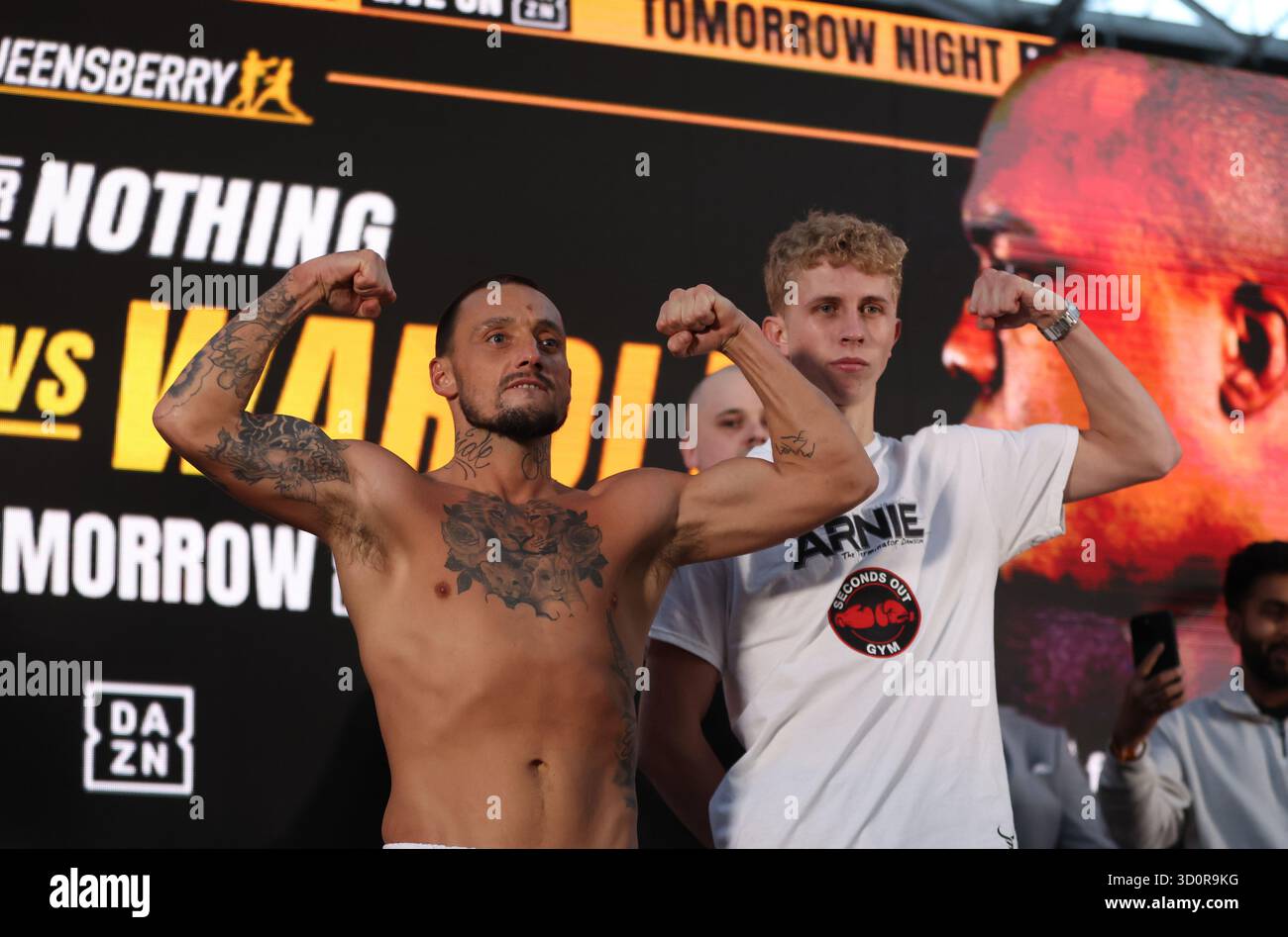 Mitchell Smith (left) and Arnie Dawson (right) during a weigh-in at Spitalfields Market, London ...