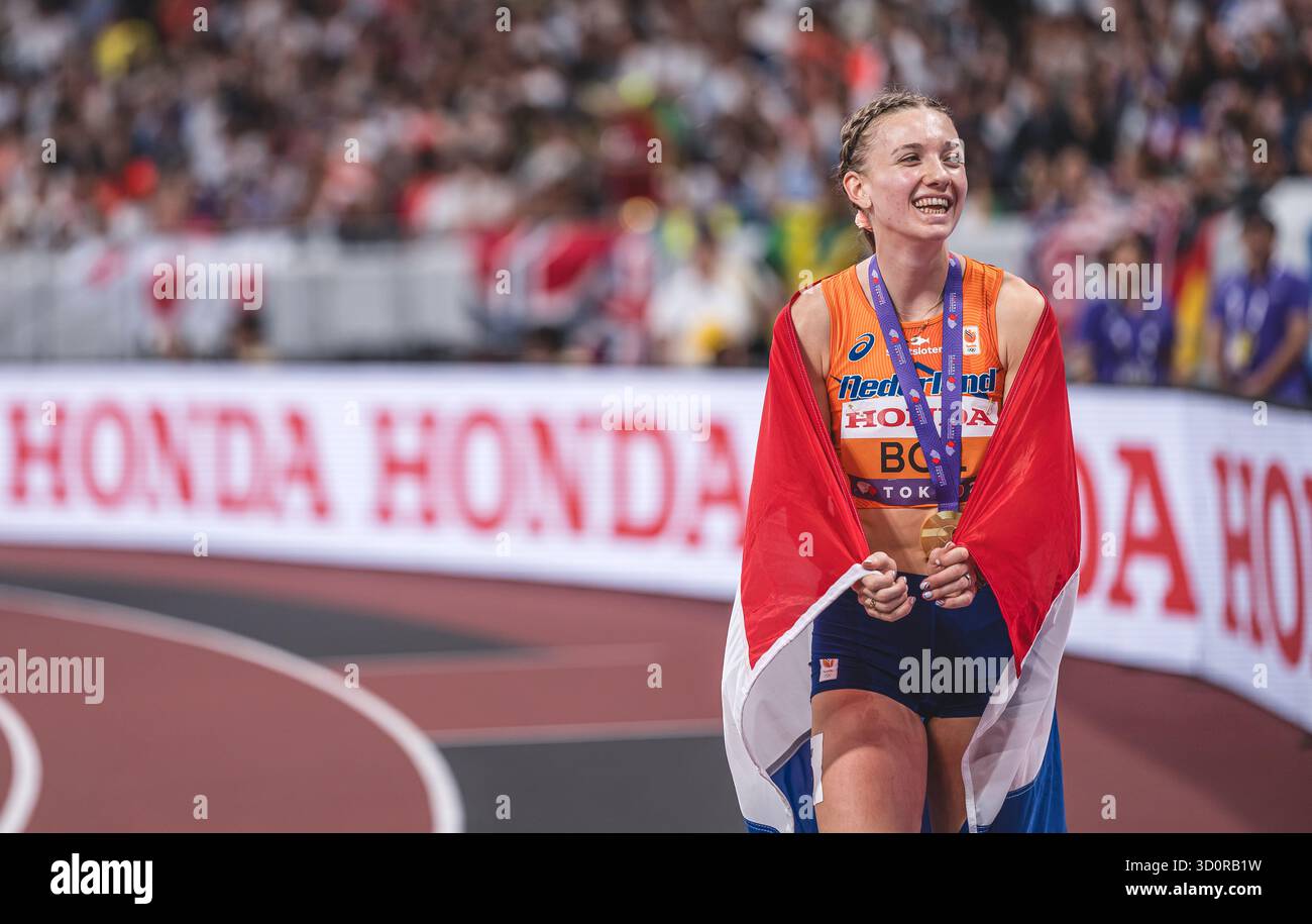 Femke Bol celebrating her medal with her country's flag at the 2025 ...