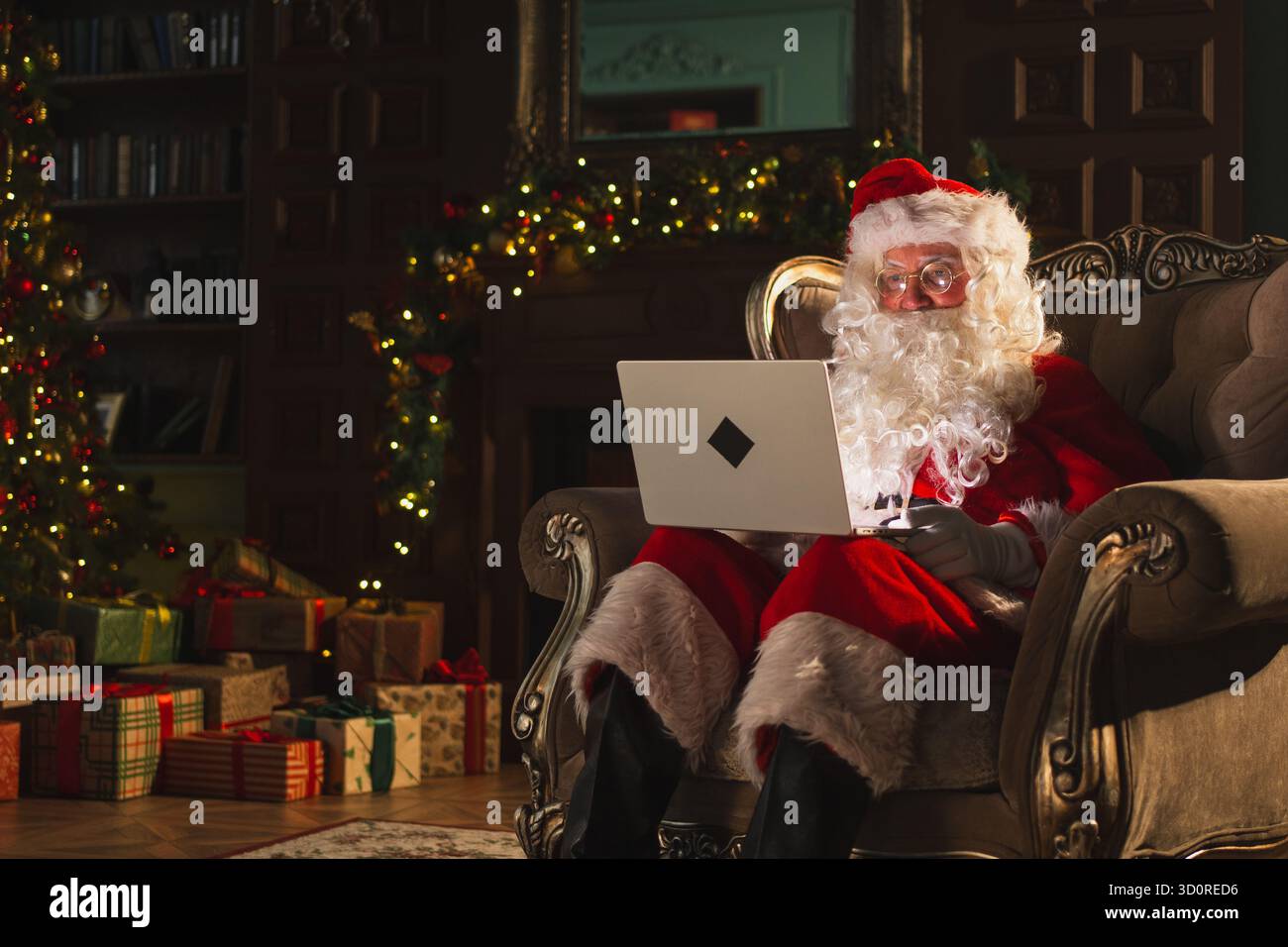Merry Christmas. Santa Claus with laptop reading letters from children ...