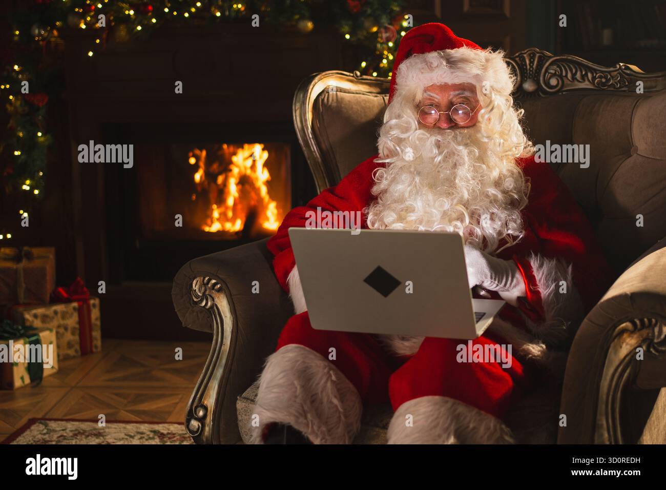 Merry Christmas. Santa Claus with laptop reading letters from children ...