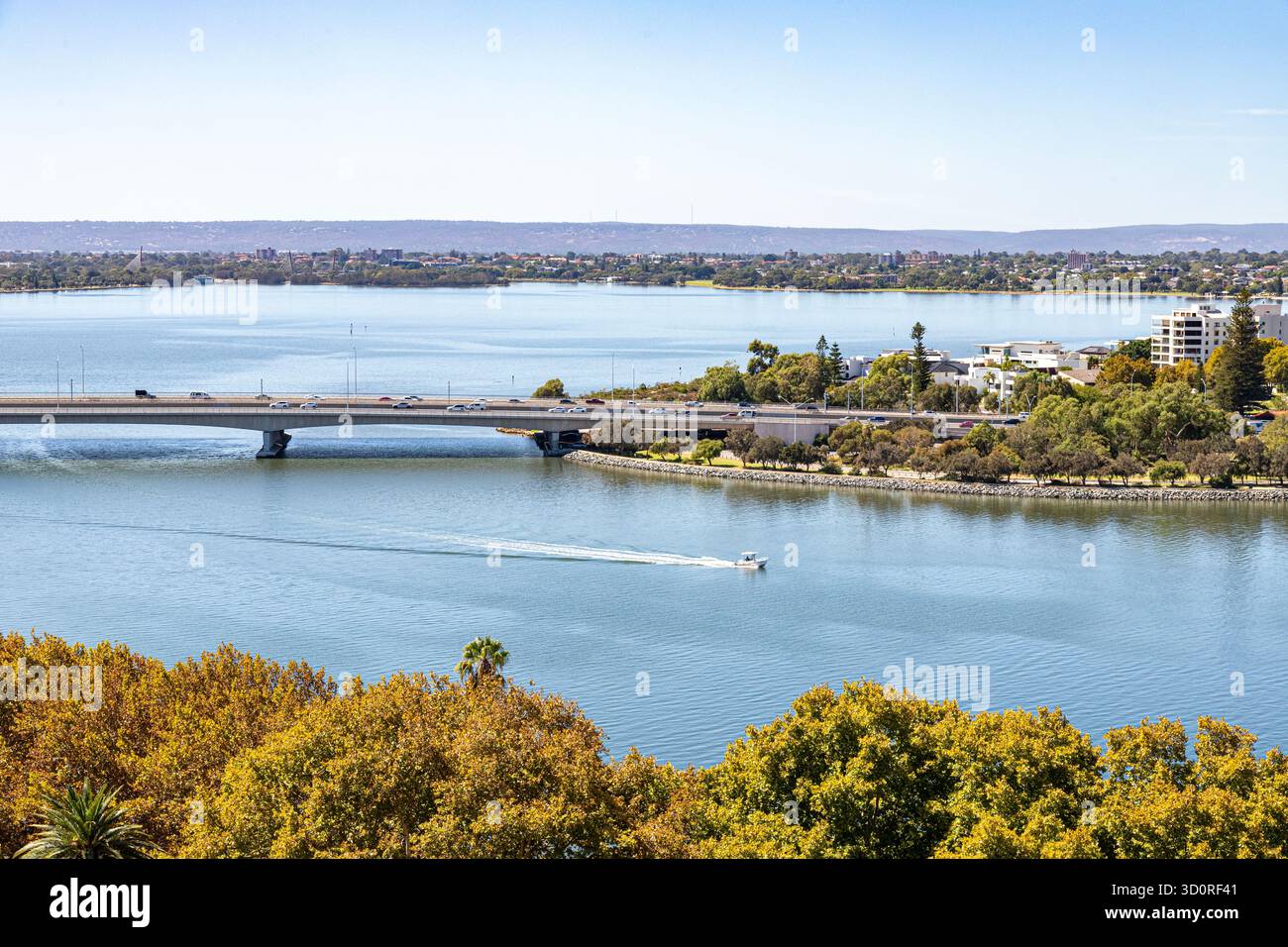 The city of Perth and the Narrows Bridge across the Swan River viewed ...