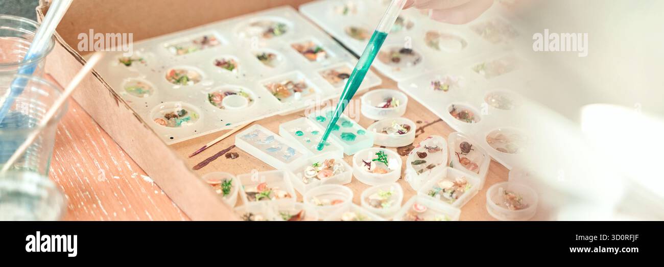 Creating resin art with floral inclusions using molds and a green ...