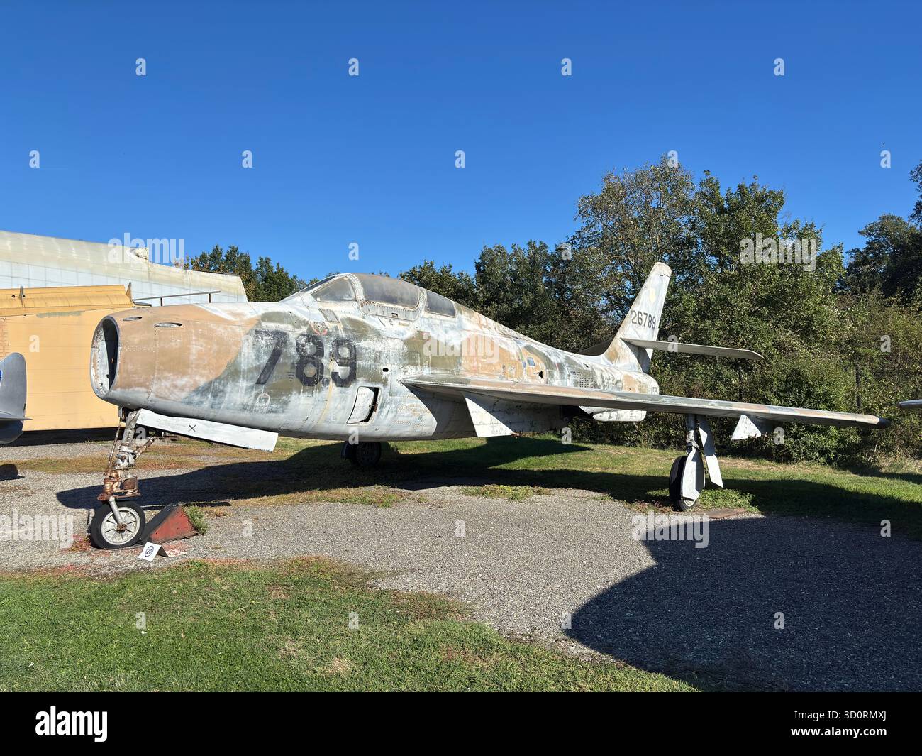 Old abandoned rusty aircraft in open air junkyard at Ailes Anciennes ...