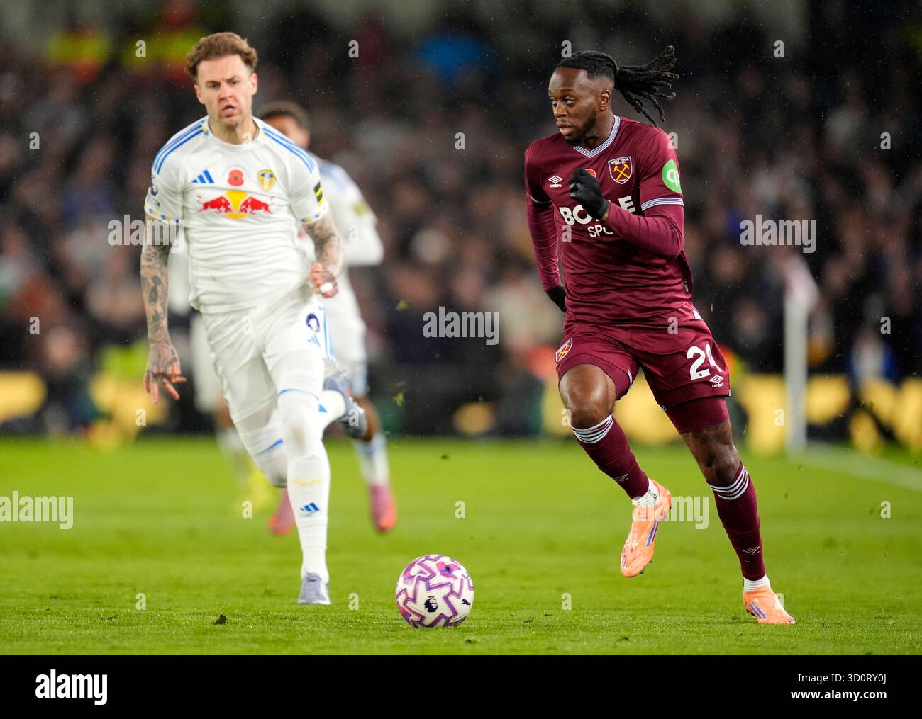 West Ham United's Aaron Wan-Bissaka (right) and Leeds United's Joe ...