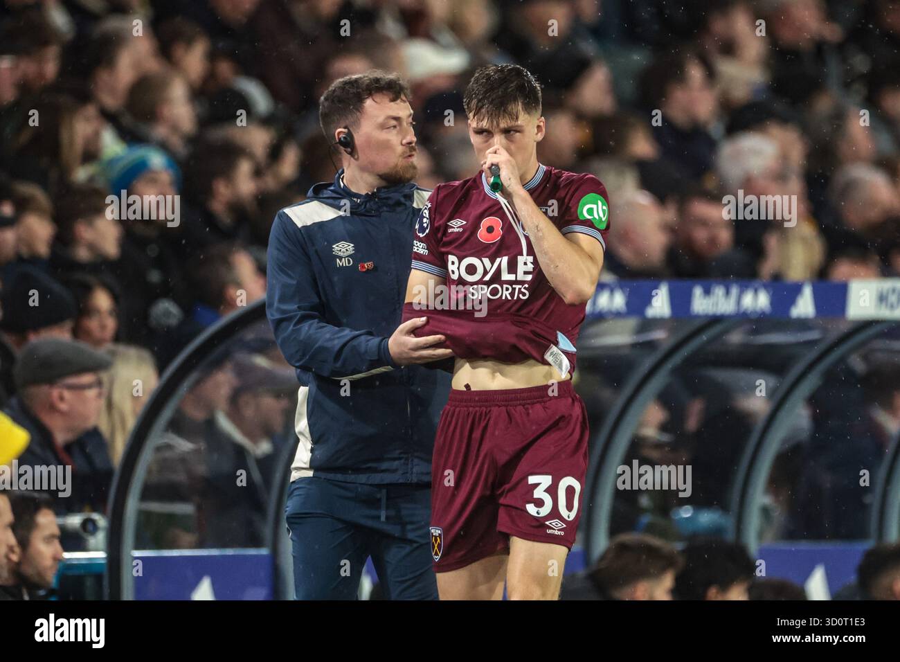 Oliver Scarles of West Ham United comes off with an injury during the Premier League match Leeds ...