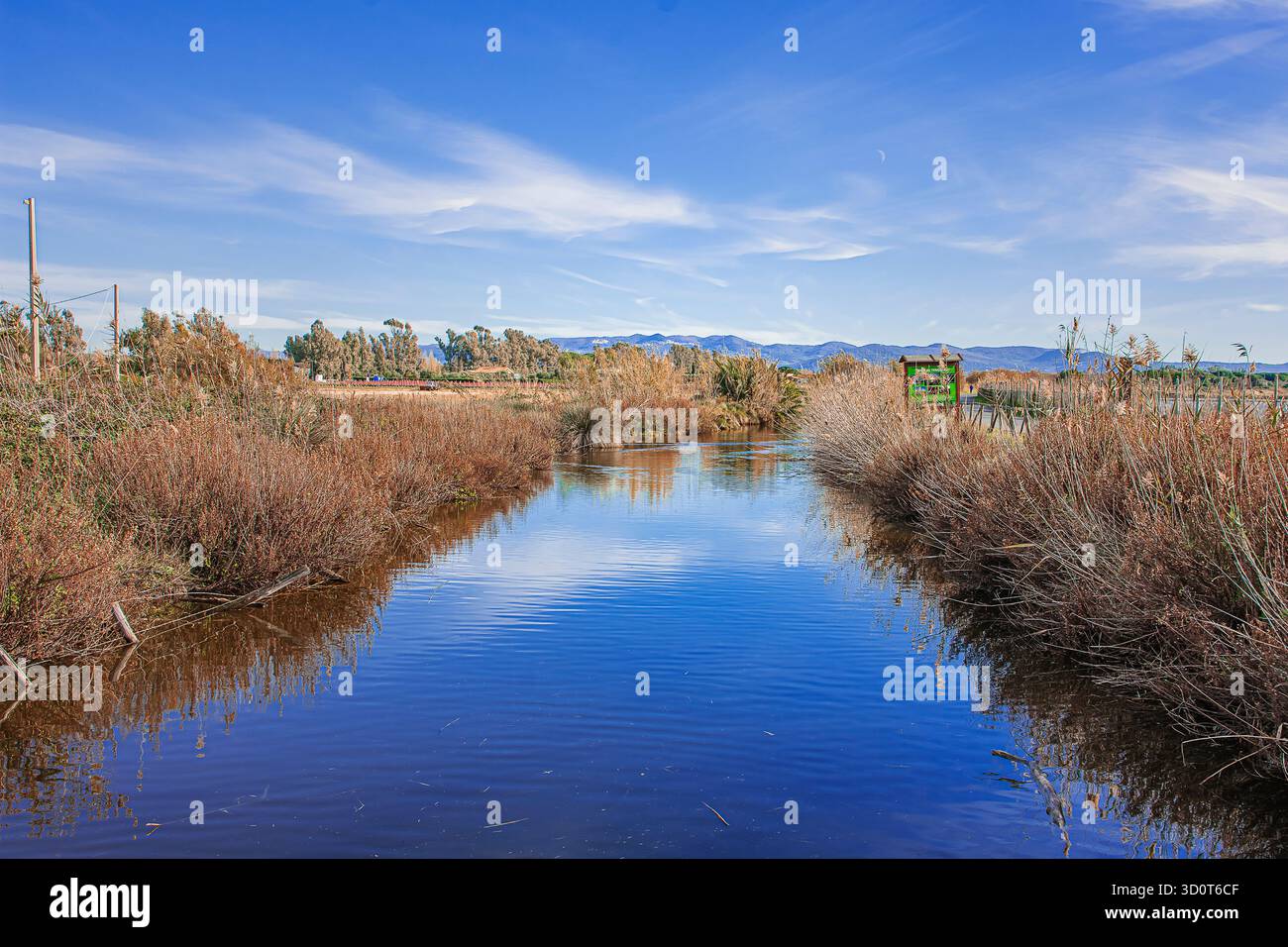 a stream merges with the blue of the sky and the sea of the Tarquinia ...