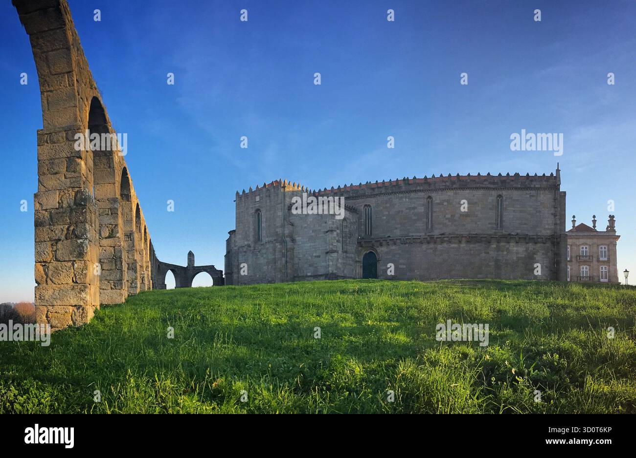 Historic aqueduct and ancient stone building of the Santa Clara church ...