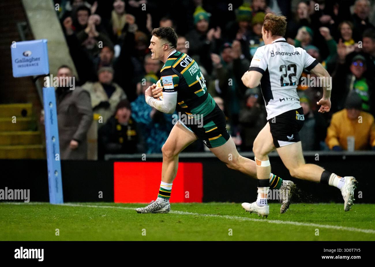 Northampton Saints' Tommy Freeman runs through to score their eighth ...