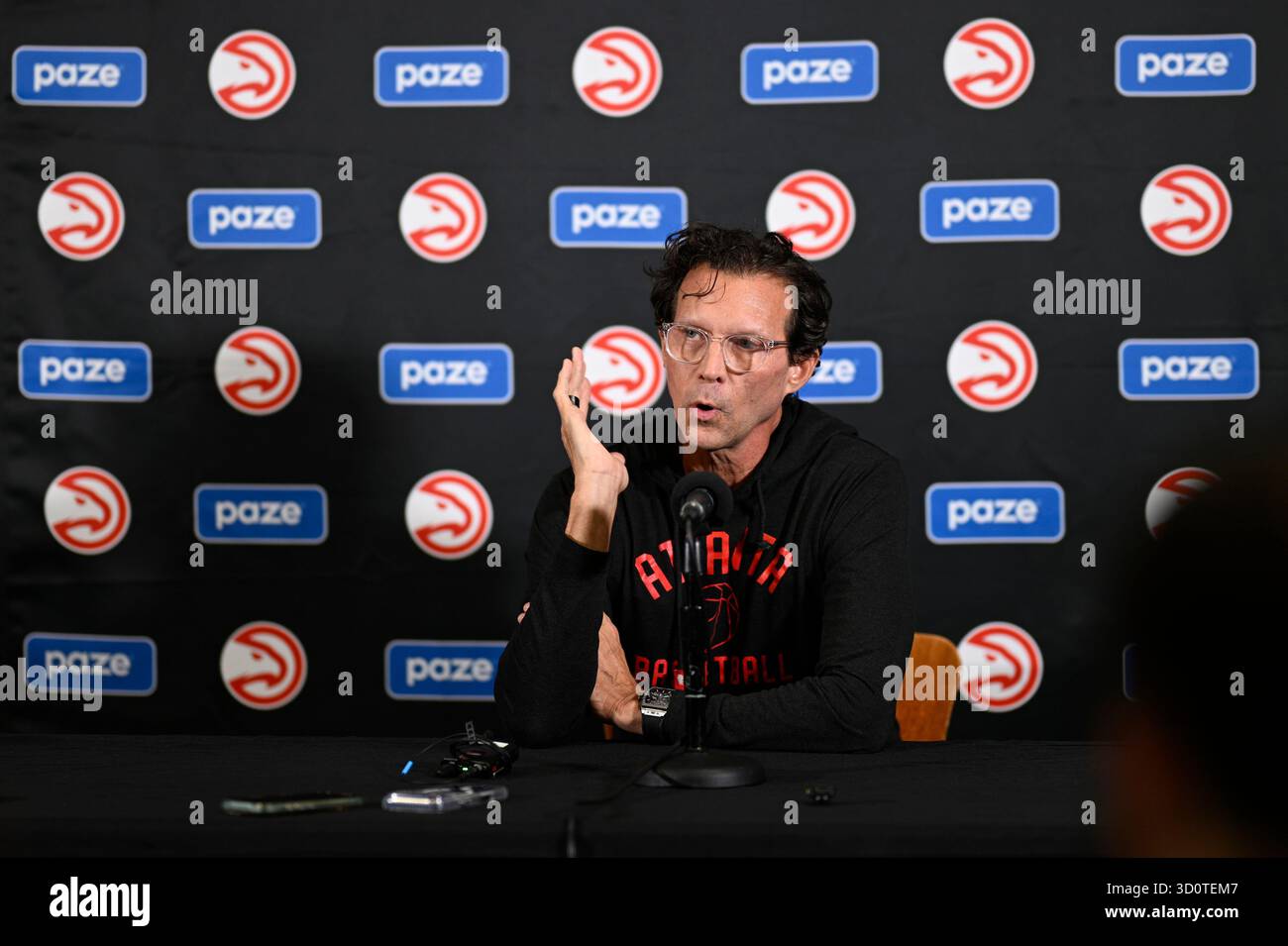 Atlanta Hawks head coach Quin Snyder talks with reporters before an NBA ...