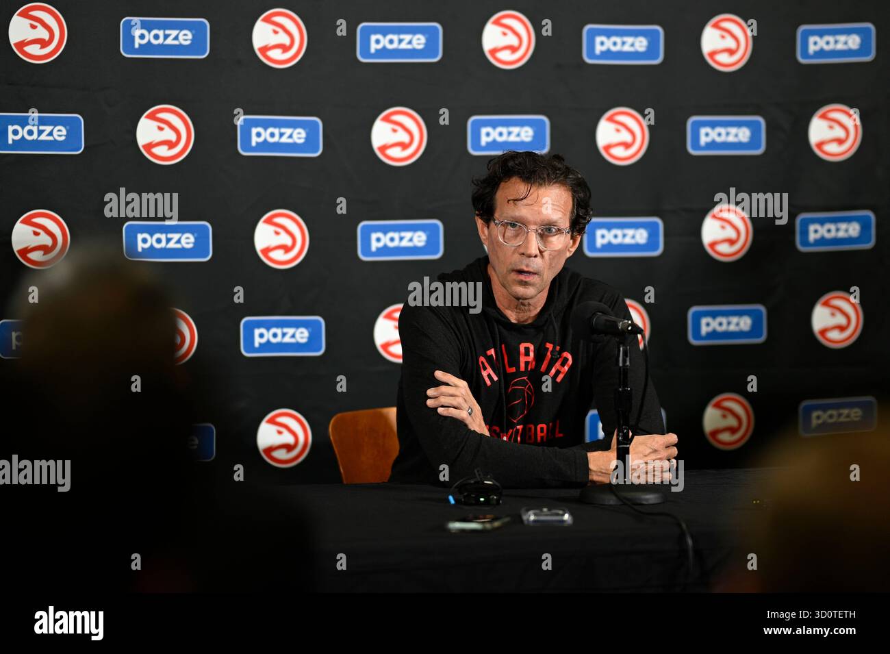 Atlanta Hawks head coach Quin Snyder talks with reporters before an NBA ...
