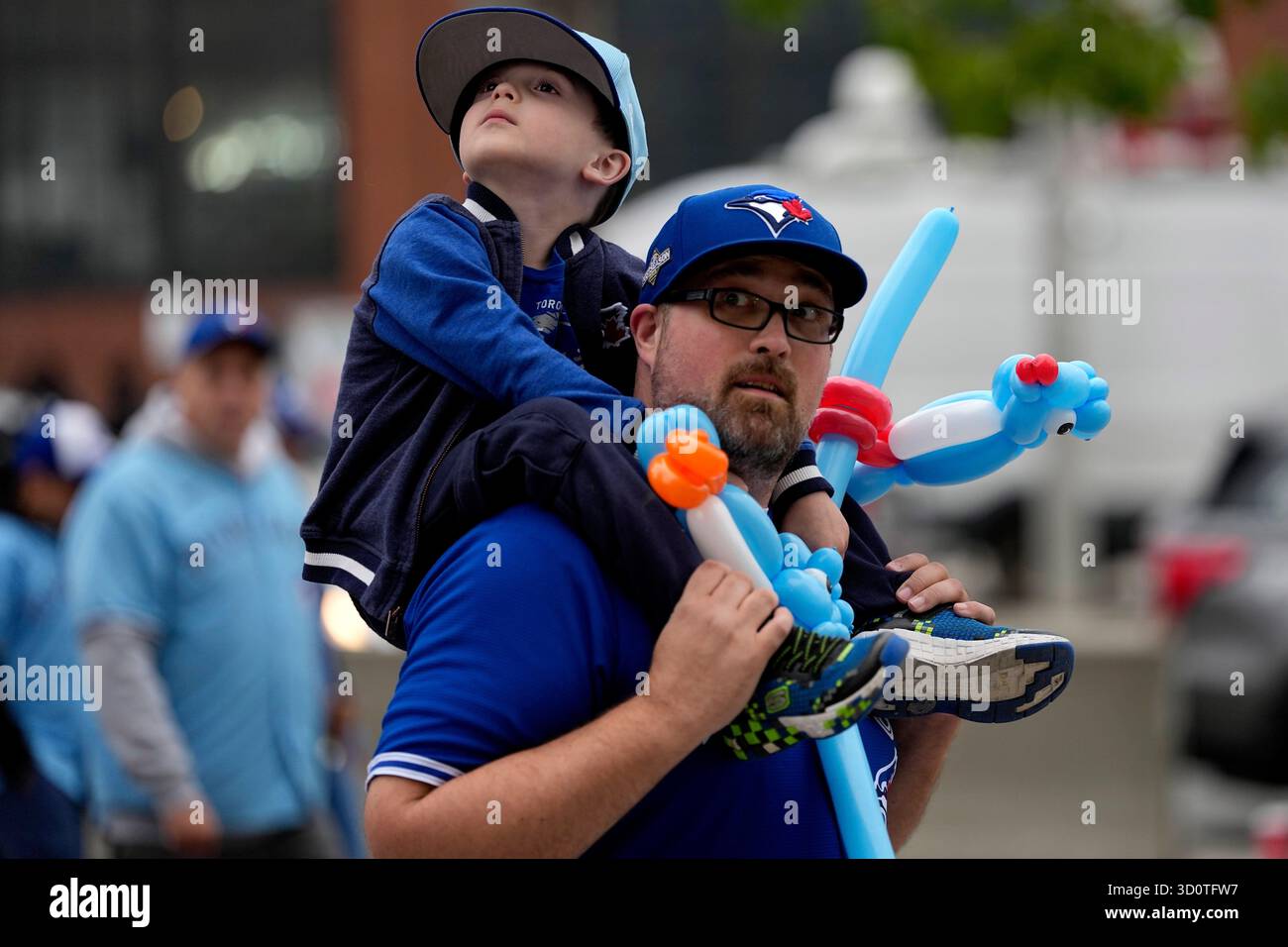 Mike Bender, and his son Cedric arrive prior to Game 1 of baseball's ...