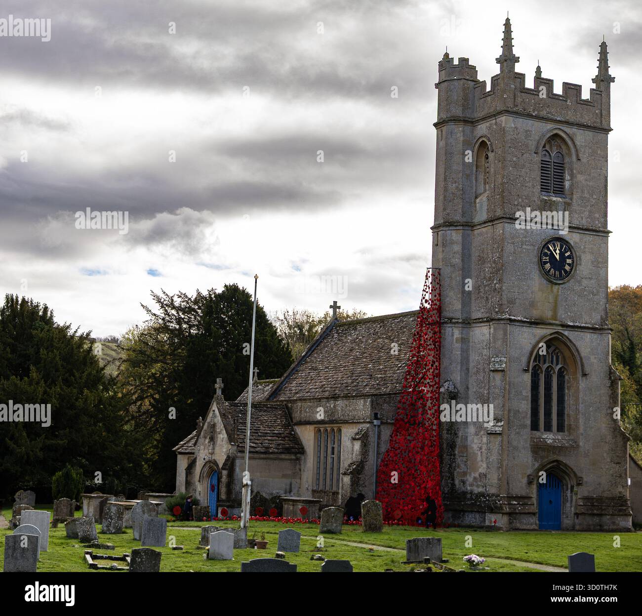 St Andrews church Heddington Wiltshire with clock tower and red ...