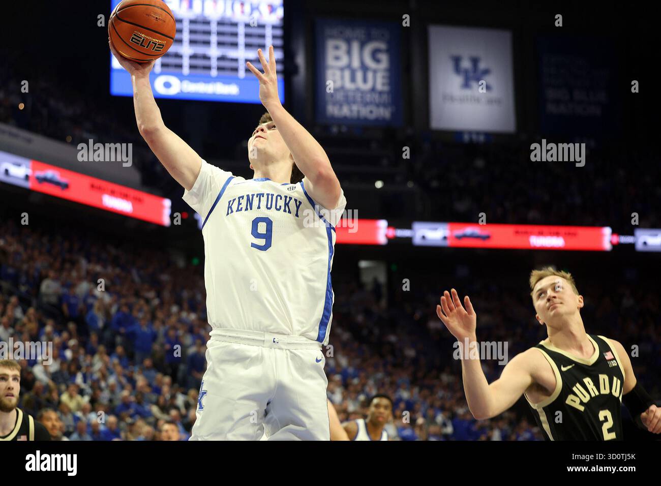 Kentucky's Trent Noah (9) shoots near Purdue's Fletcher Loyer (2 ...