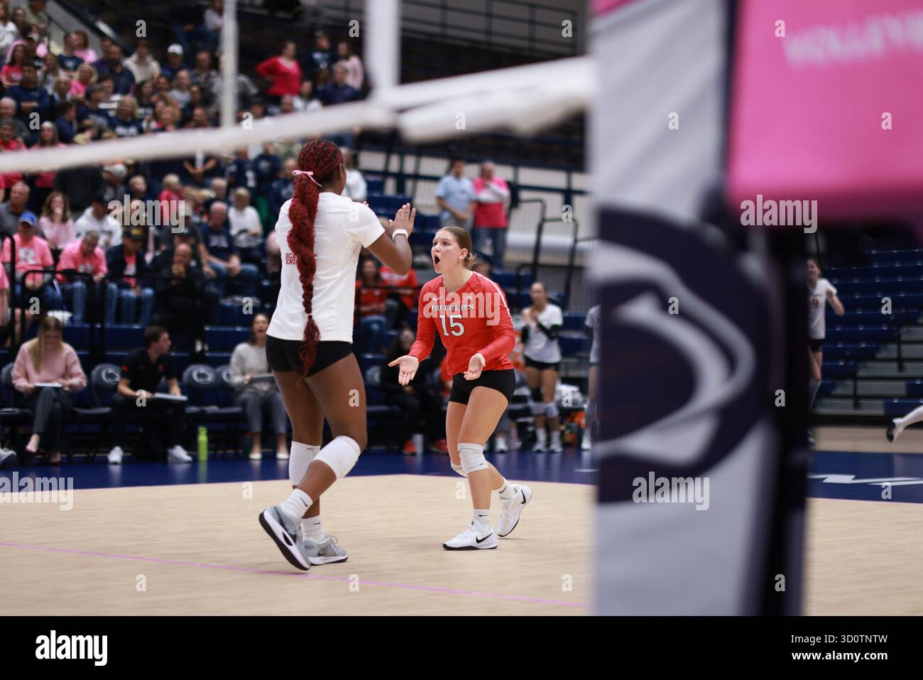 Rutgers outside hitter Aspen Maxwell, left, and libero Alleigh Dutton ...