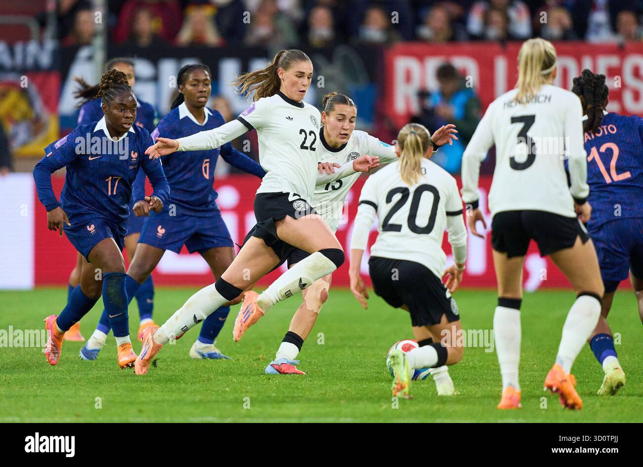 Jule Brand of Germany Carlotta Wamser of Germany compete for the ball ...