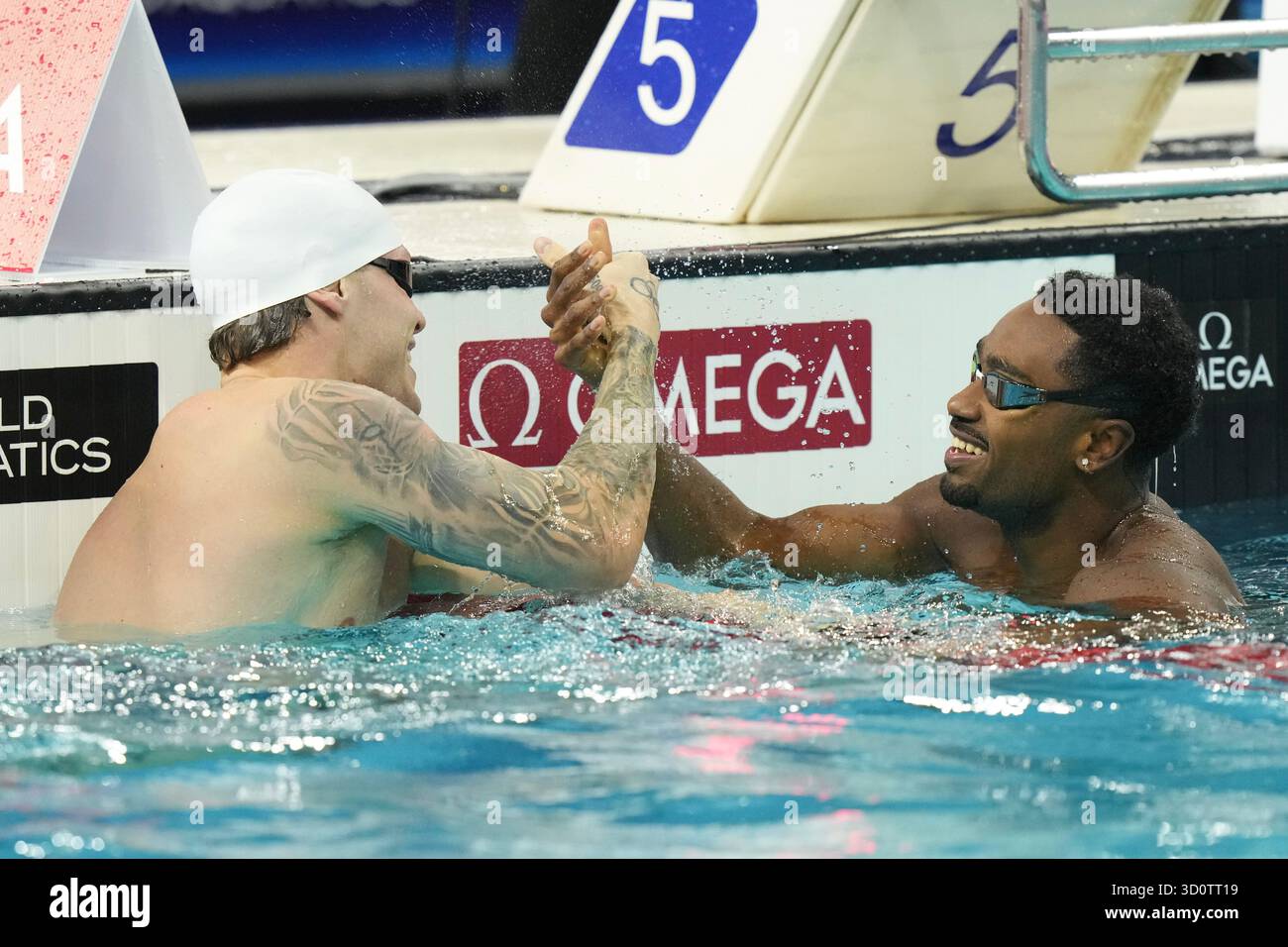 Canada's Josh Liendo, right, is congratulated by Britain's Matthew ...