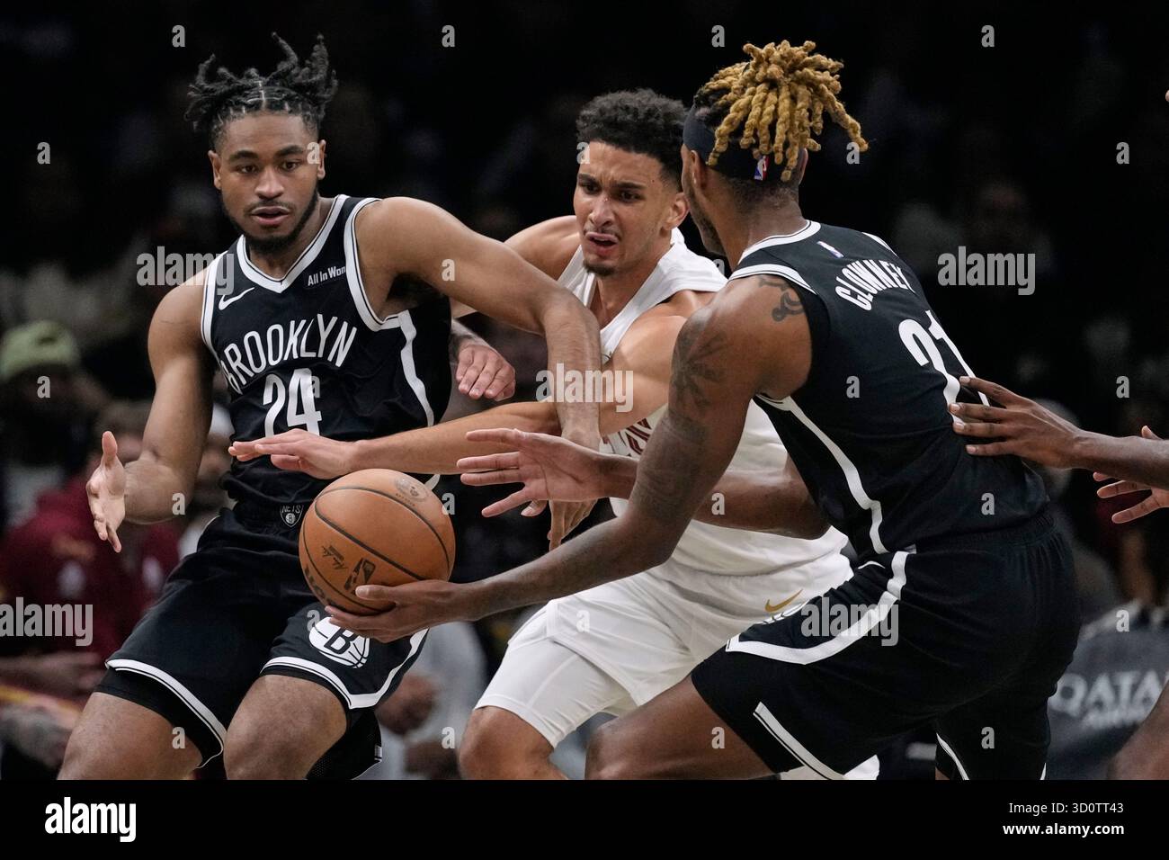 Cleveland Cavaliers' Tyrese Proctor (24) defends Brooklyn Nets' Cam ...