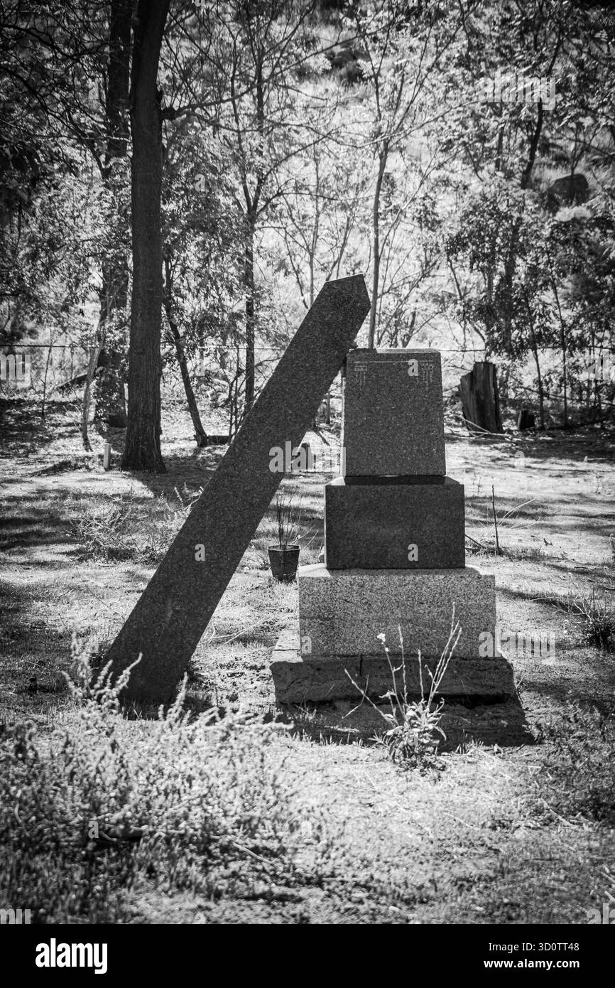 Broken leaning grave monument hi-res stock photography and images - Alamy