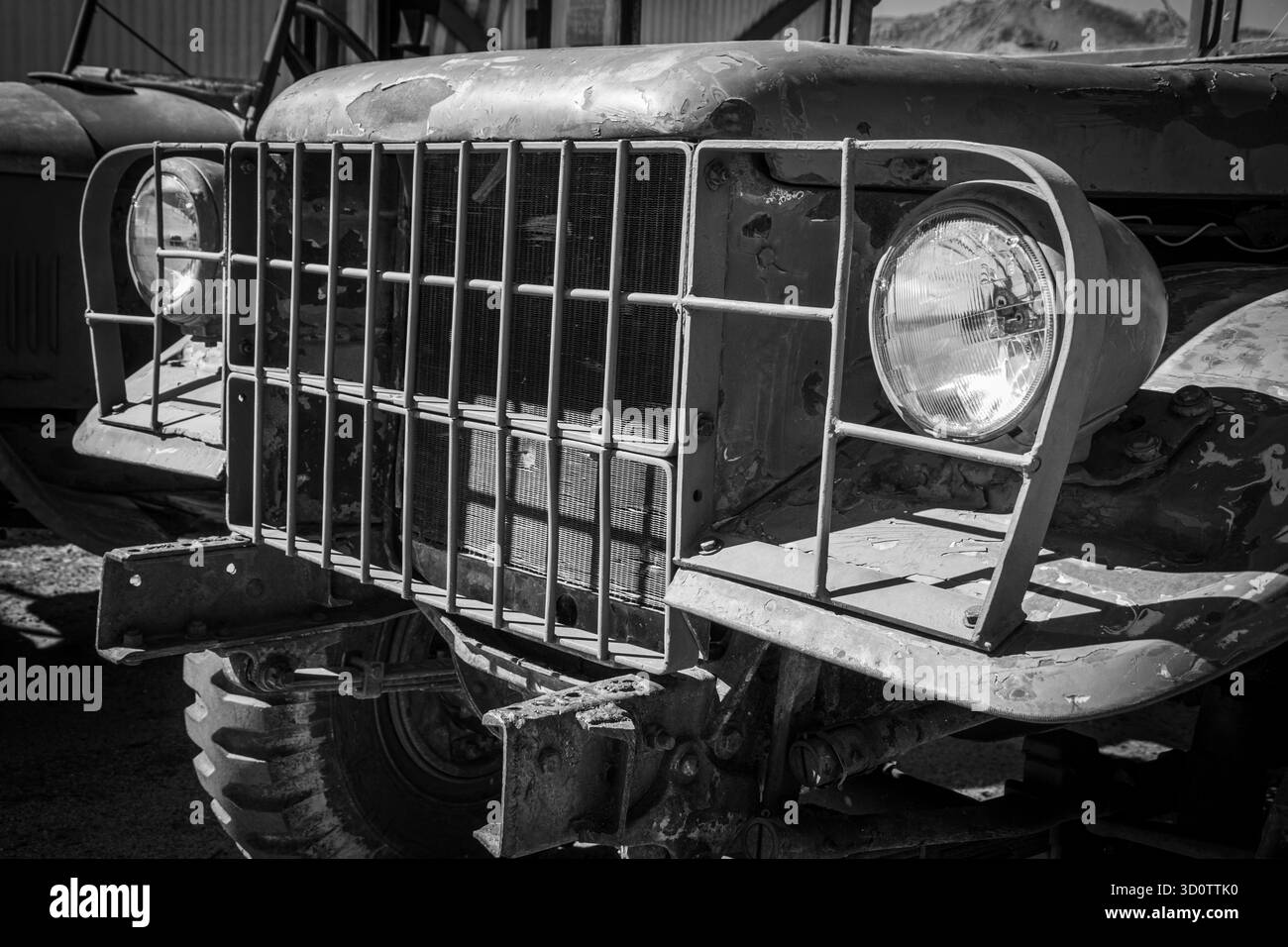 Military Truck Brush Guard. A metal brush guard protects the front of a ...