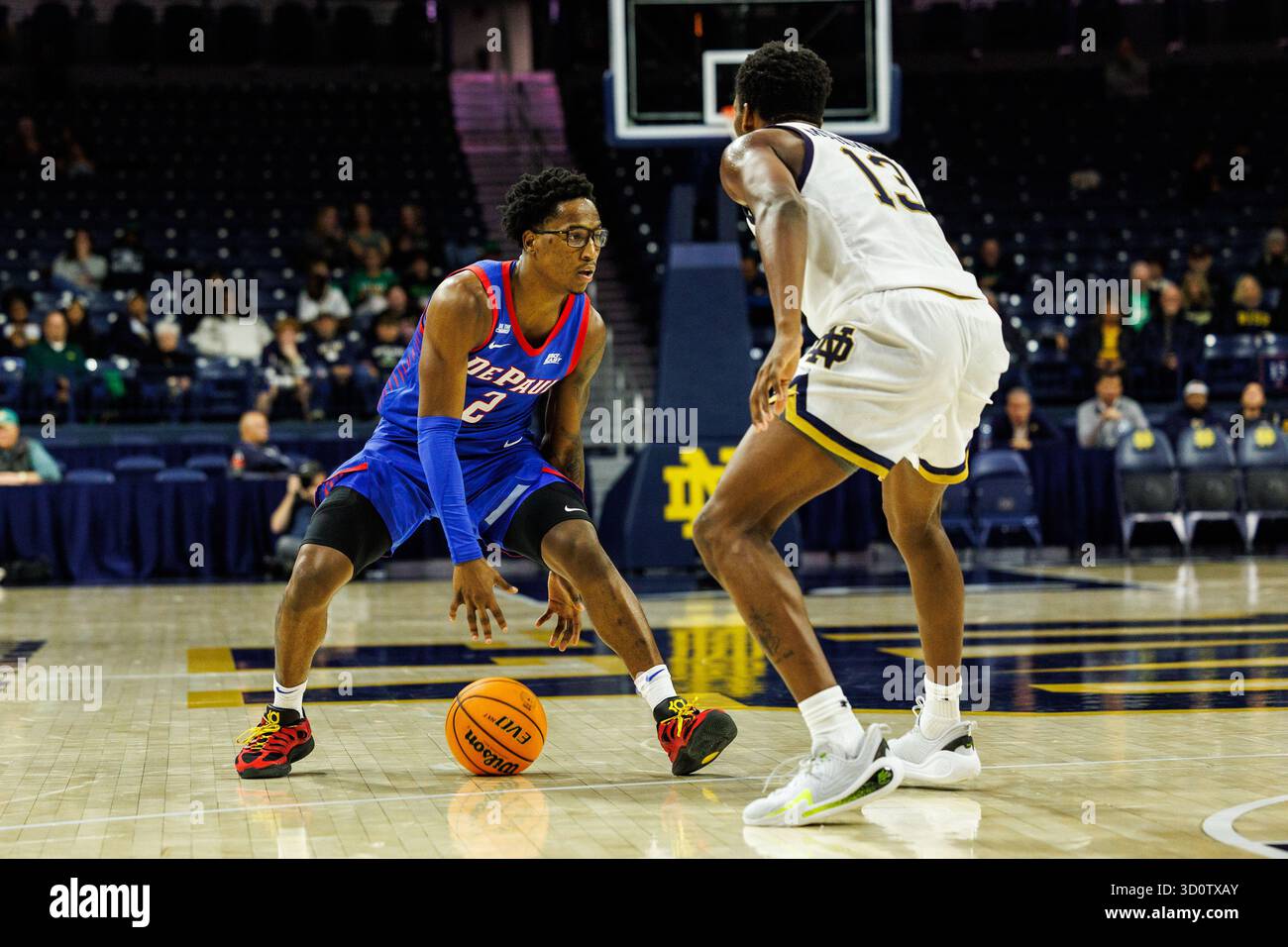 October 24, 2025: DePaul guard Layden Blocker (2) dribbles the ball as Notre Dame guard Sir ...