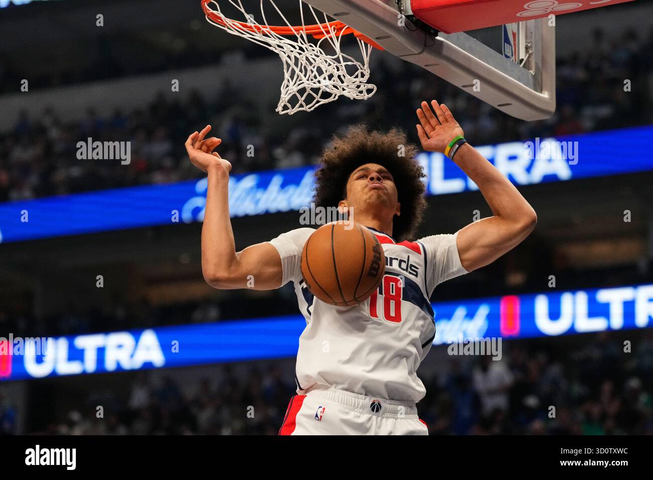 Washington Wizards forward Kyshawn George dunks in the first half of an ...