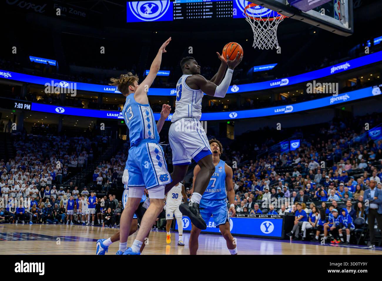 BYU center Keba Keita, top right, goes to the basket defended by North ...