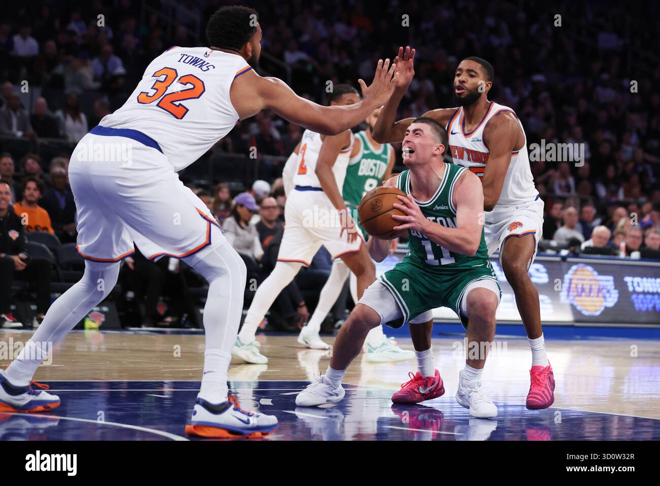 Boston Celtics guard Payton Pritchard (11) looks to get around New York ...