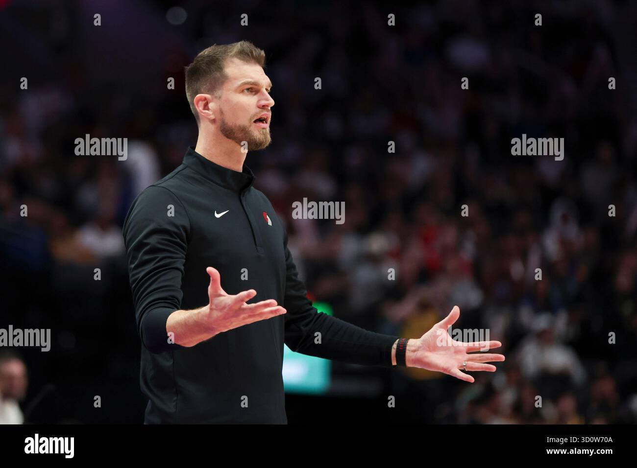 Portland Trail Blazers acting head coach Tiago Splitter reacts to a ...