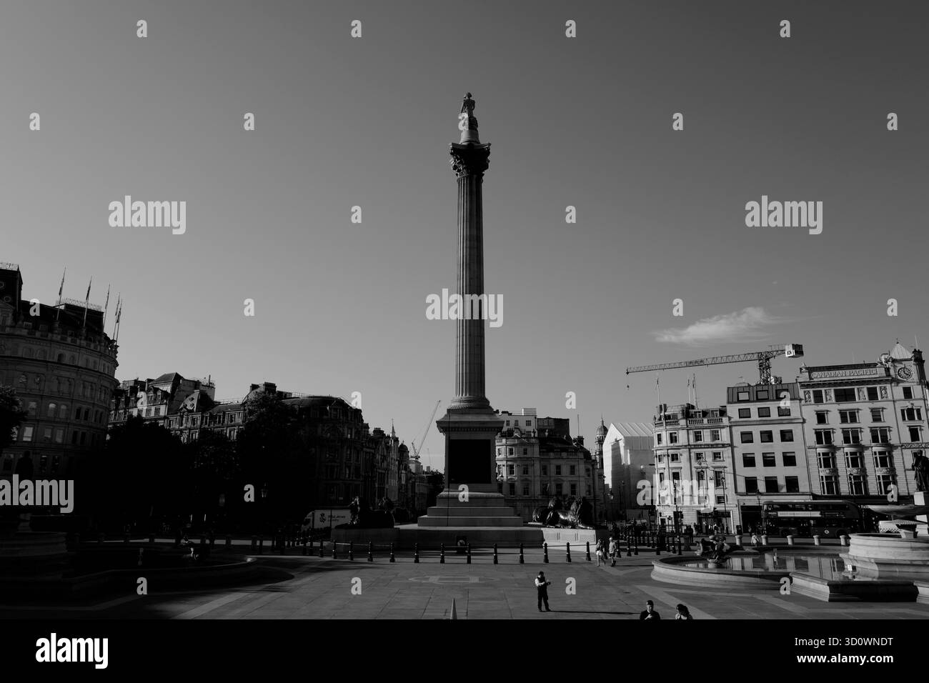Tourists and locals at Trafalgar Square, a historic London landmark ...