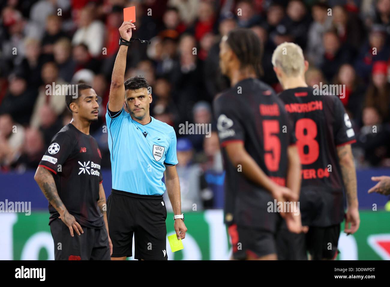 LEVERKUSEN - (l-r) Referee Jesus Gil Manzano gives the red card to ...