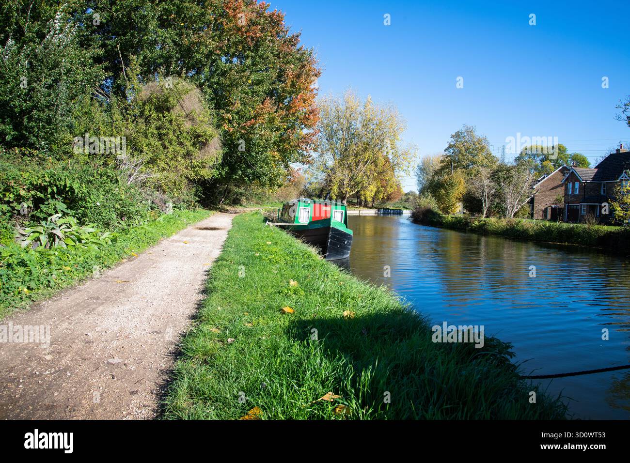 Sunny day view of the River Lea Navigation at Enfield Lock, showing a ...