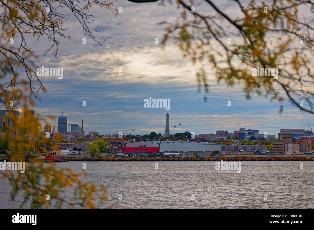 Bunker Hill Monument viewed from across the Mystic River Stock Photo ...