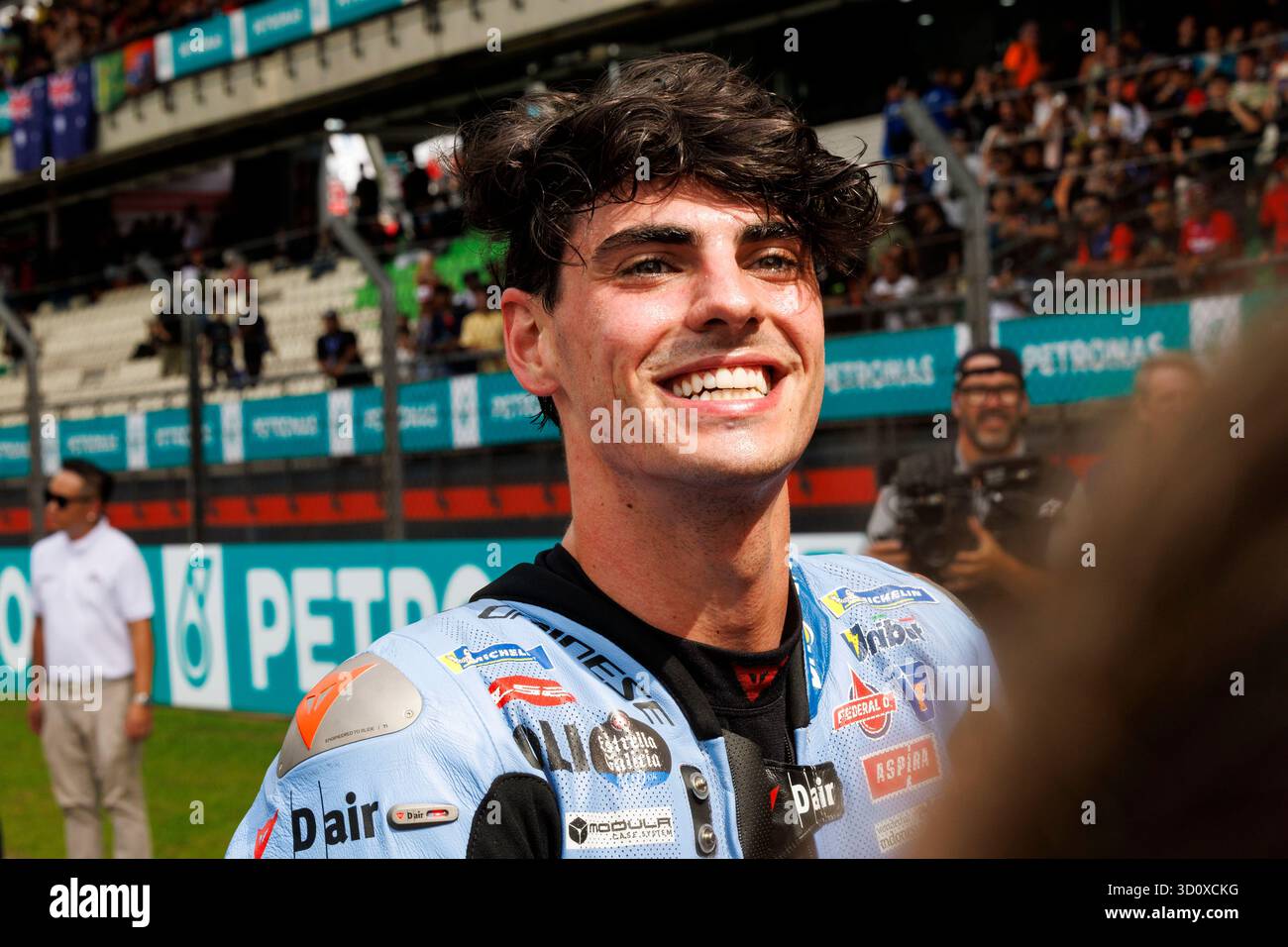 Number 54 Gresini Racing MotoGP rider Fermin Aldeguer celebrates coming ...