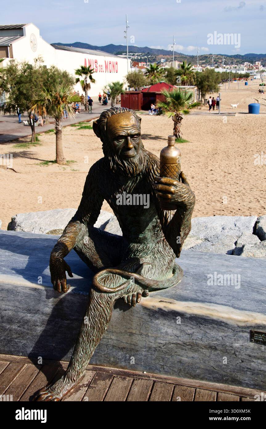 Sculpture of a human-sized monkey holding a bottle of anise liqueur ...