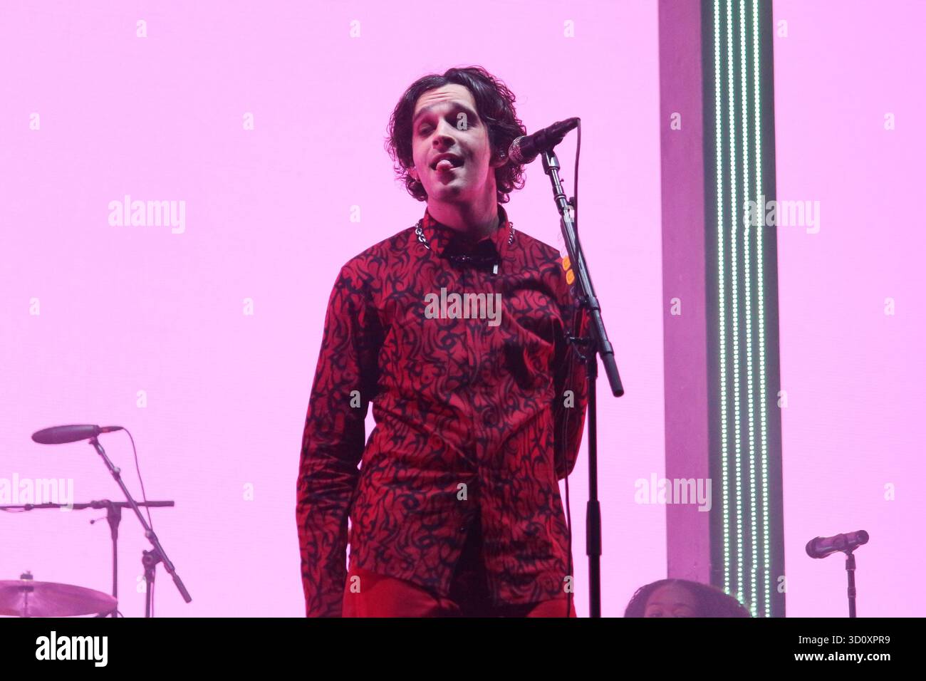 The 1975 frontman Matty Healy on stage with a guitar at Sziget Festival ...