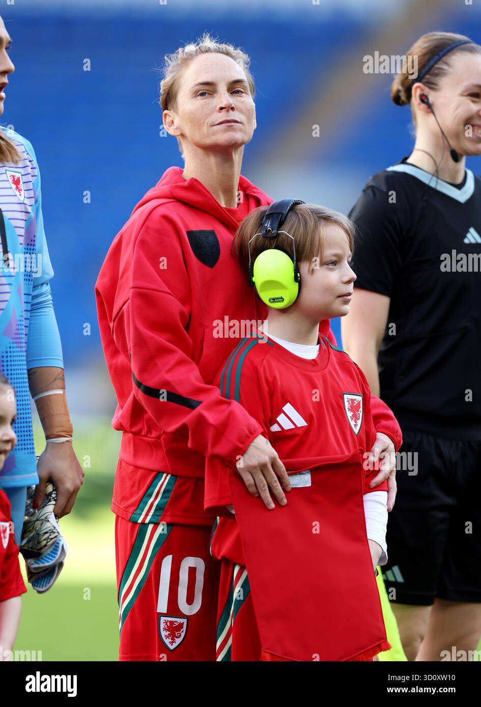 Wales' Jess Fishlock with a mascot ahead of the international friendly ...