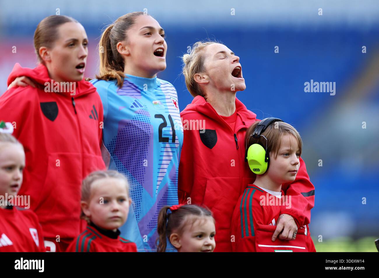 Wales' Jess Fishlock (right) singing the national anthem ahead of the ...
