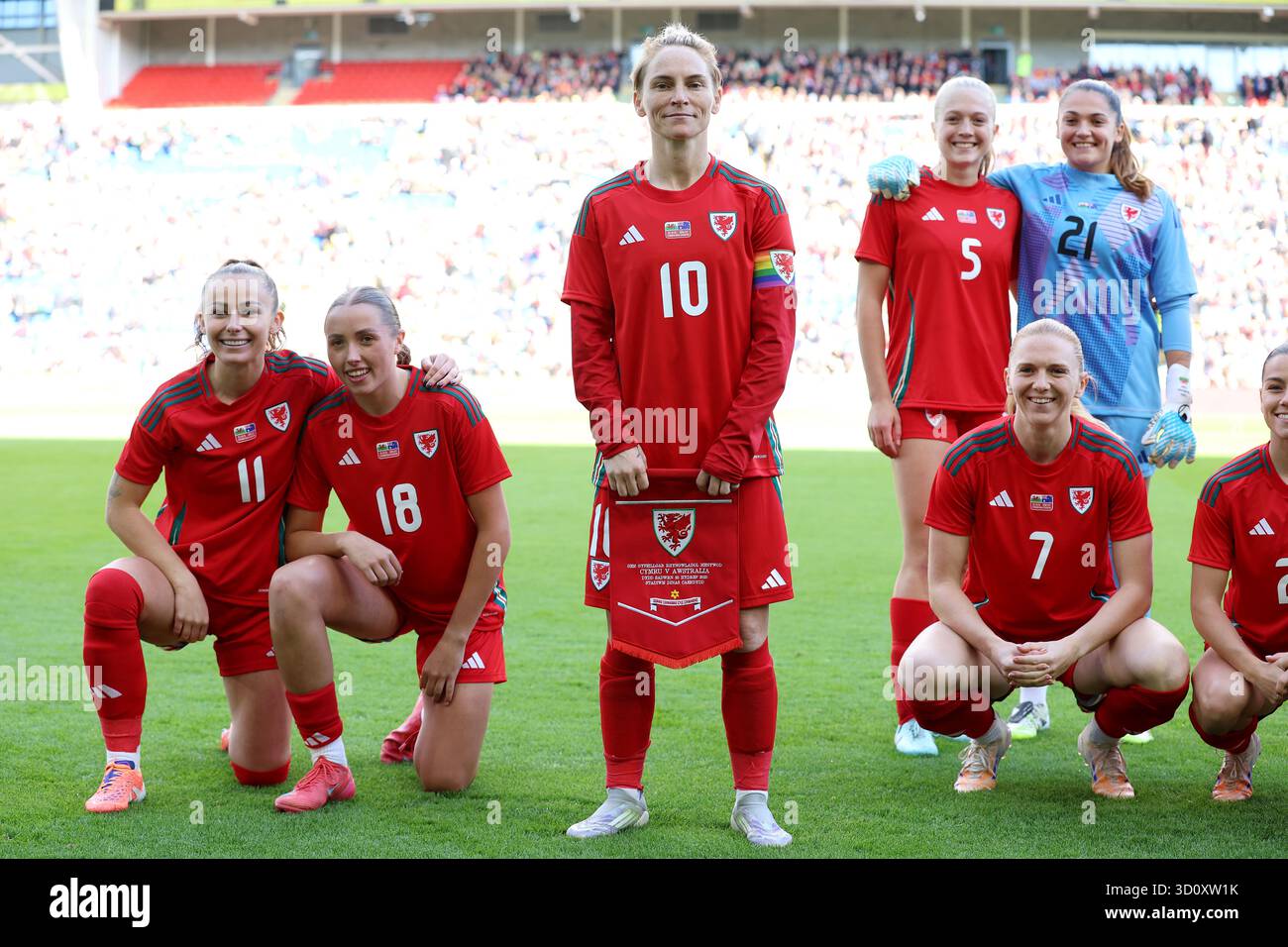 Wales' Jess Fishlock poses with team-mates for a team photo ahead of ...