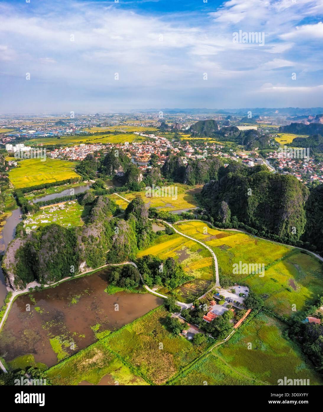 A stunning aerial view of the Ngo Dong River winding through limestone ...