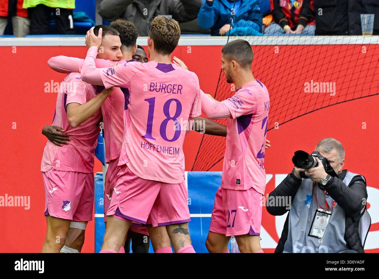 Hoffenheim's Tim Lemperle, left, celebrates scoring with teammates ...