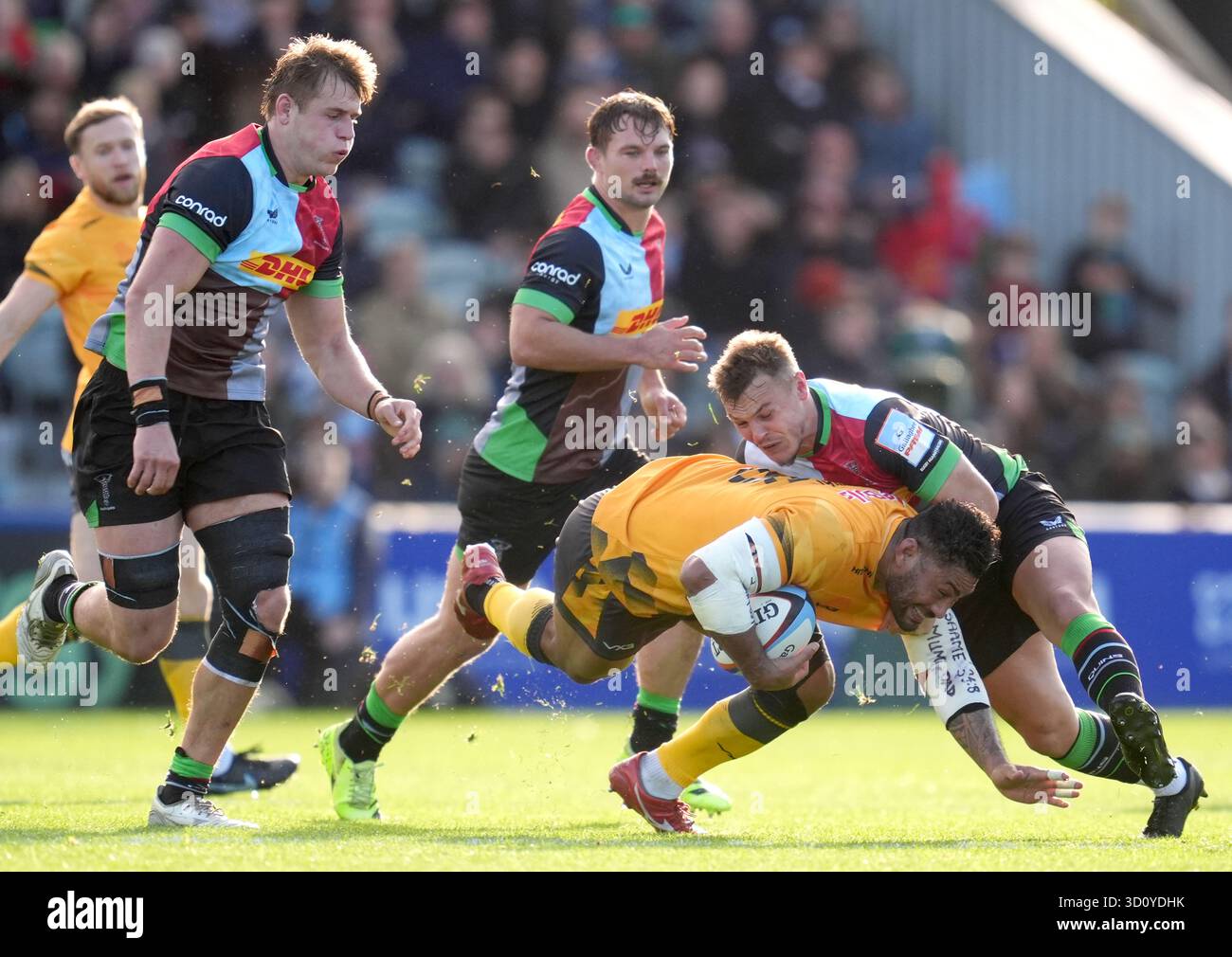 Newcastle Red Bulls' Amanaki Mafi and Harlequins' Jarrod Evans (right ...
