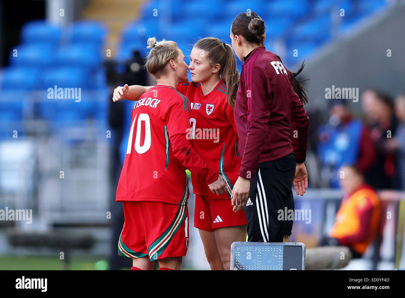 Jess Fishlock (left) is replaced by substitute Tianna Teisar on her ...