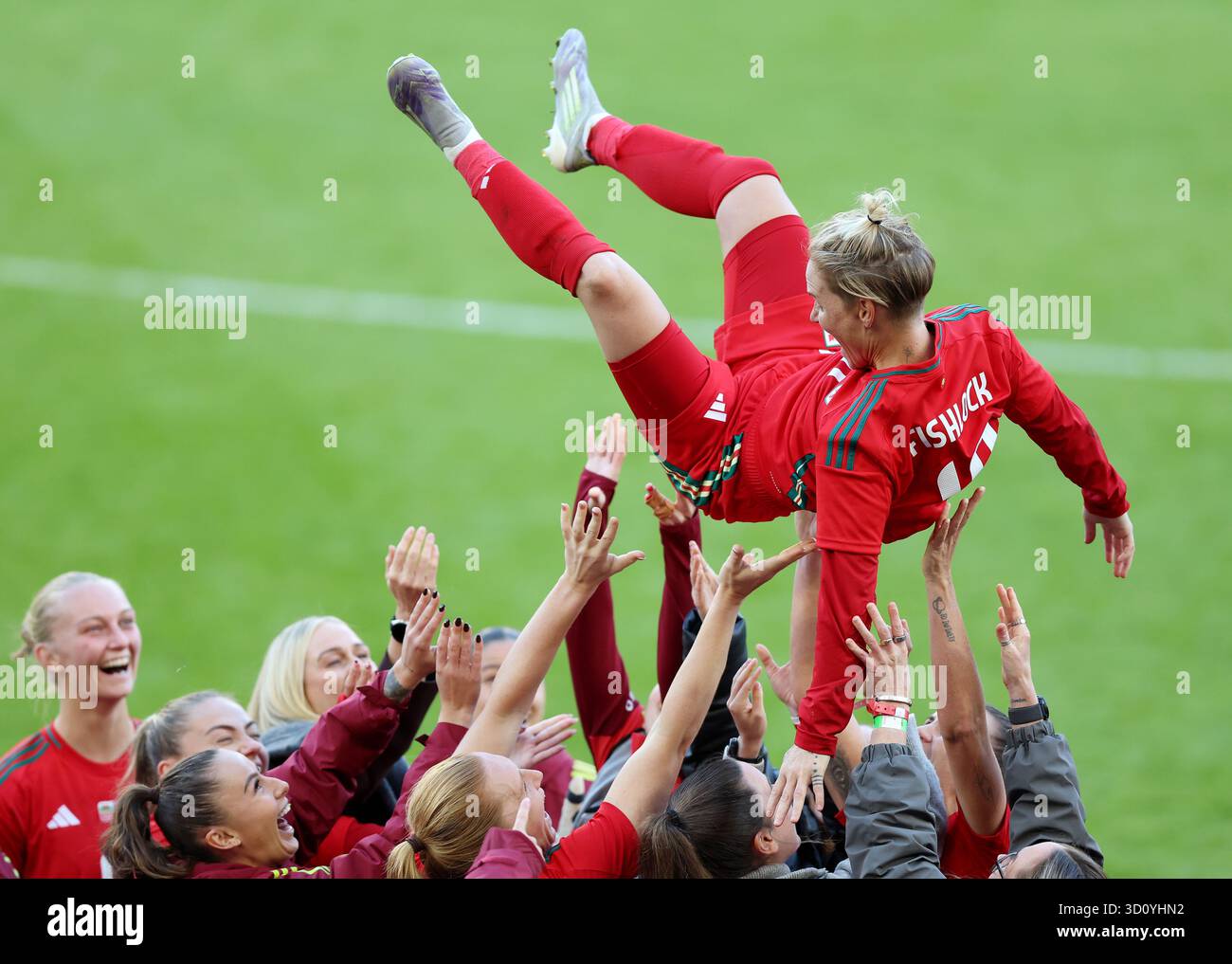 Jess Fishlock is thrown into the air by her team-mates after playing ...
