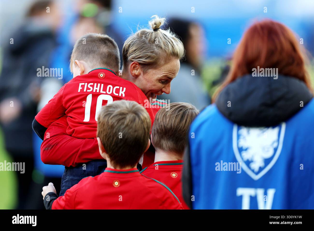 Jess Fishlock reacts with members of her family after playing her final ...