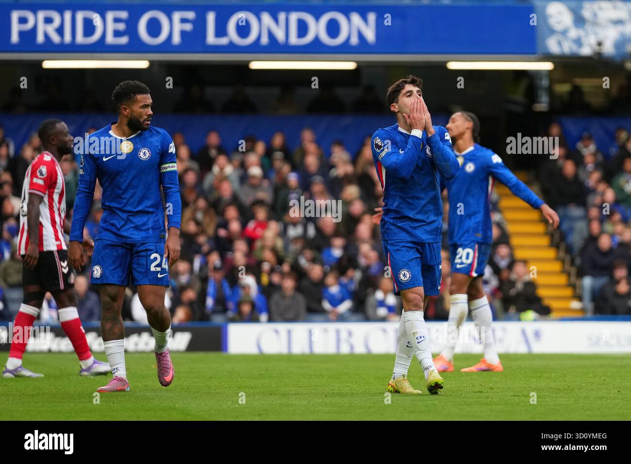 Chelsea's Reece James, Pedro Neto and Joao Pedro, from left, react ...