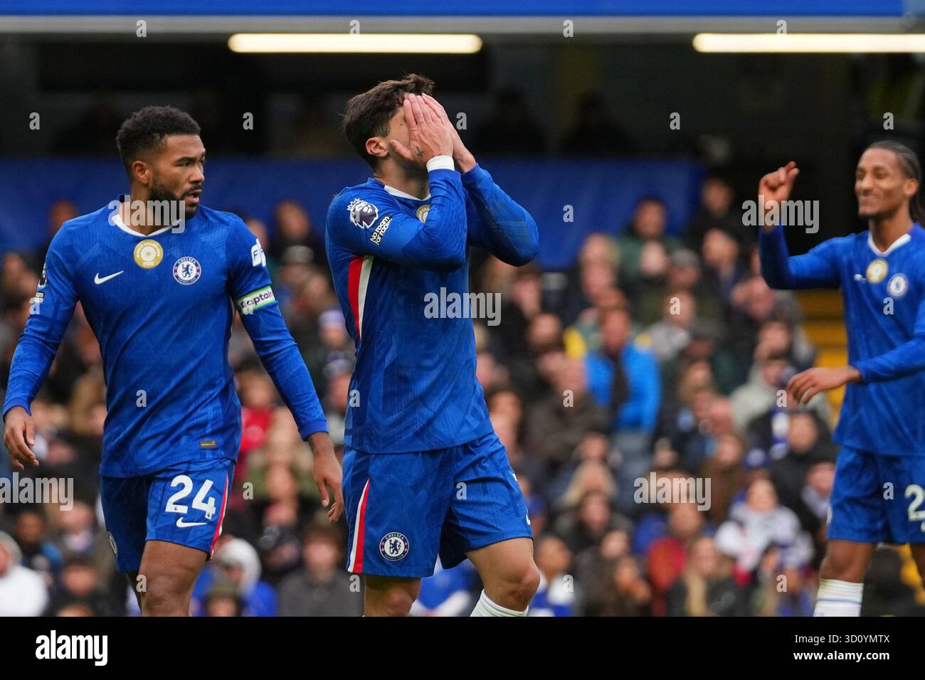 Chelsea's Reece James, Pedro Neto and Joao Pedro, from left, react ...